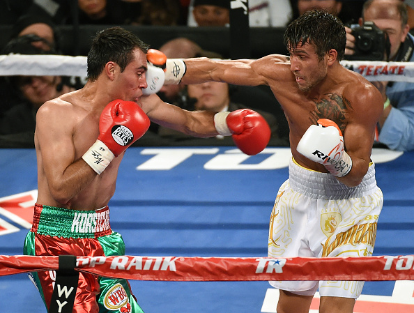 Romulo Koasicha, Vasyl Lomachenko