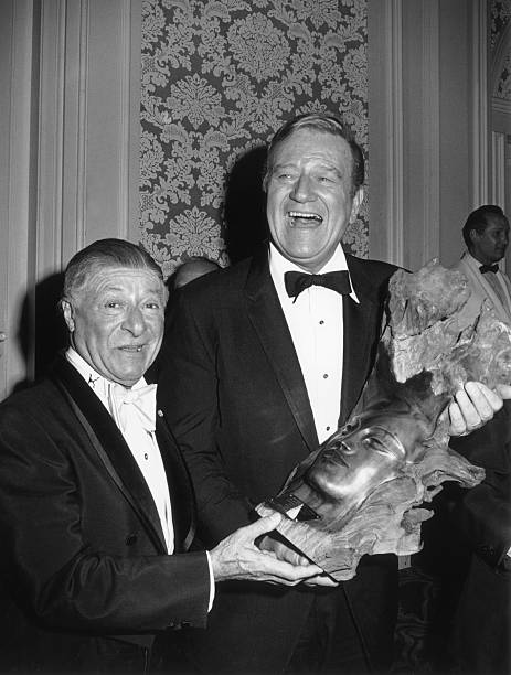 George Jessel, John Wayne