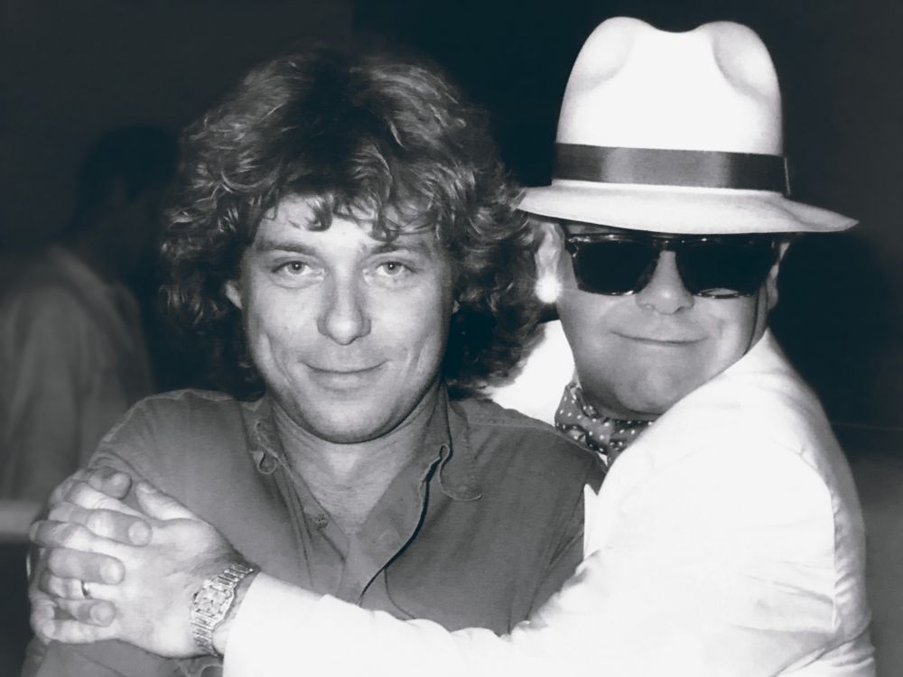 With Elton John