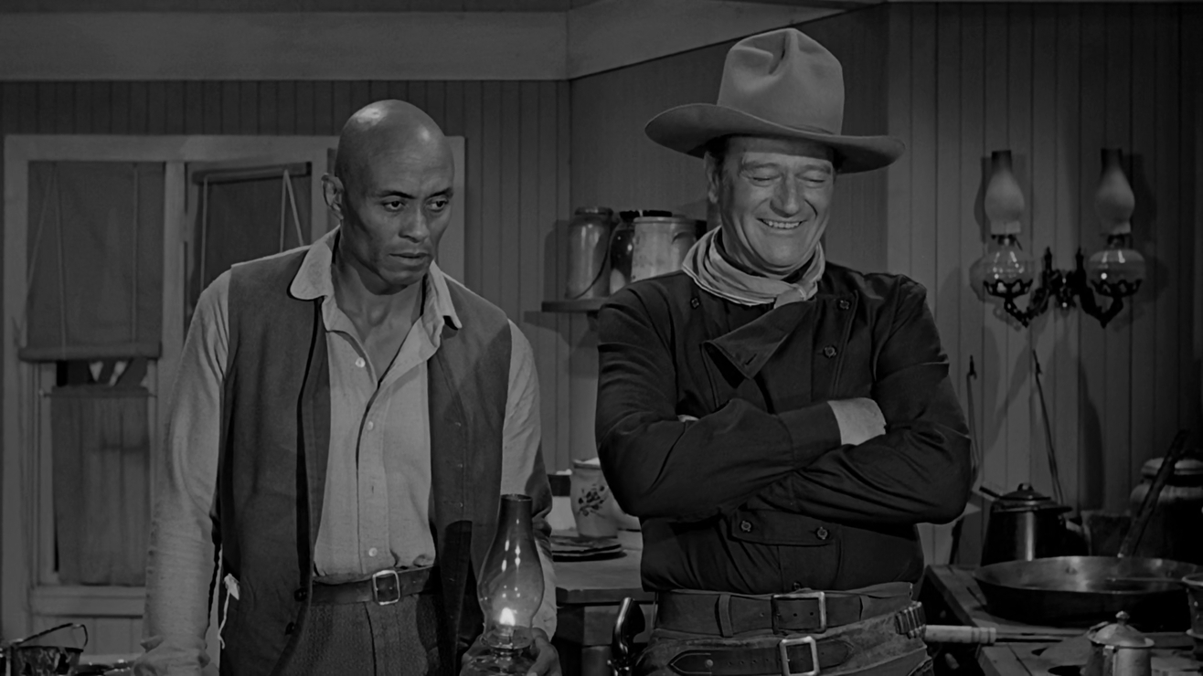 Woody Strode and John Wayne