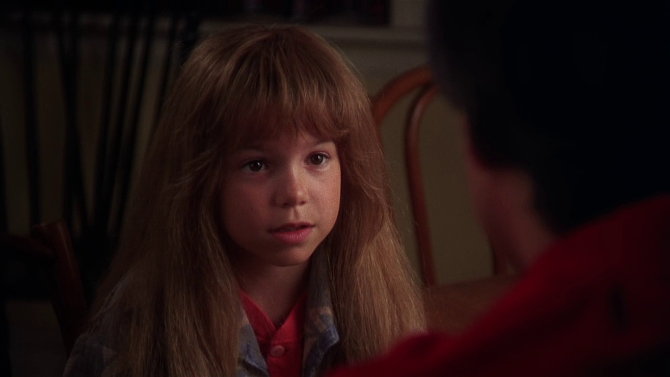 Ellen Hamilton Latzen and Chevy Chase