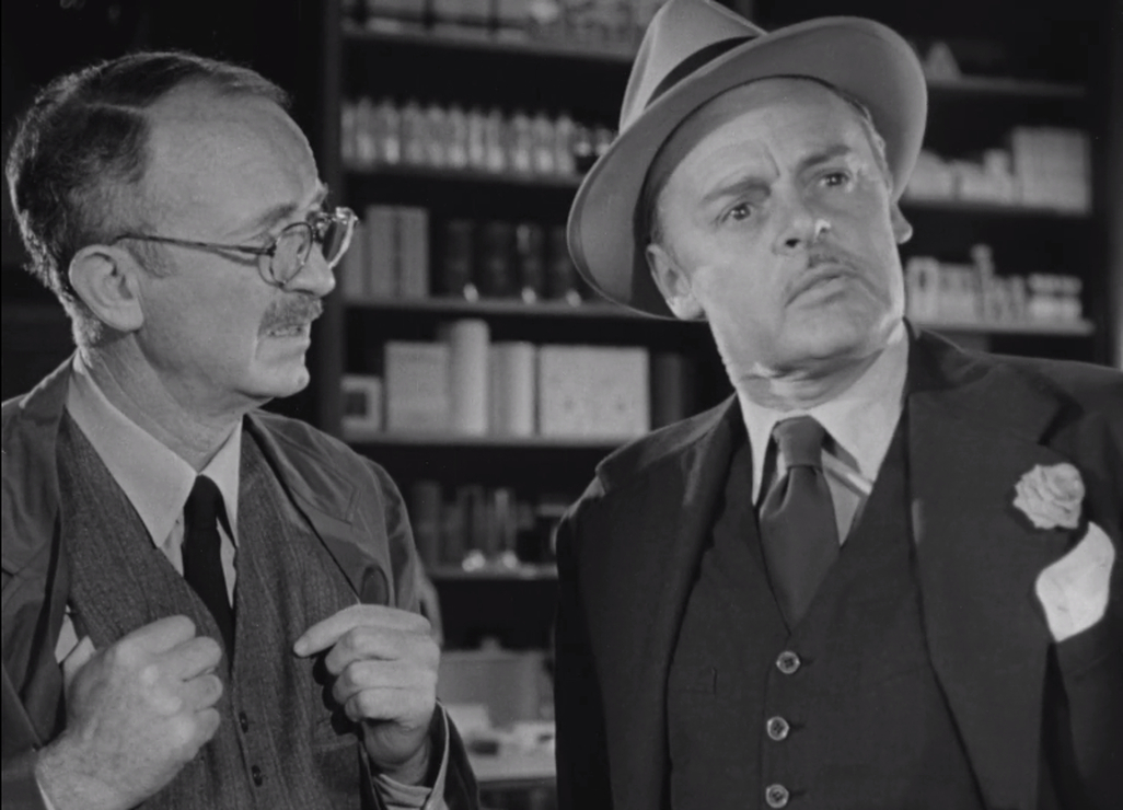 Walter Brennan and Jerome Cowan