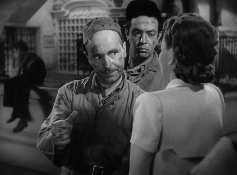 Mikhail Rasumny and Olivia de Havilland