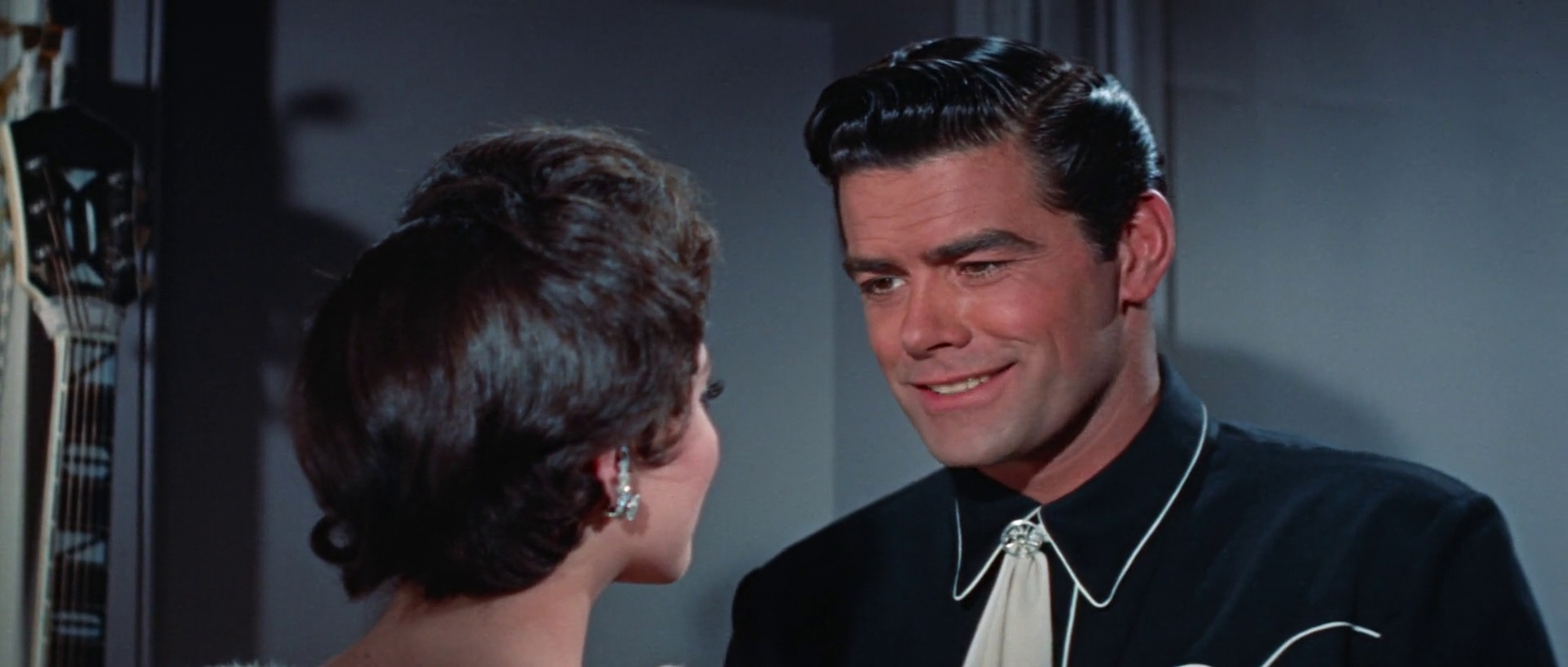 Joan Collins and Jeff Richards