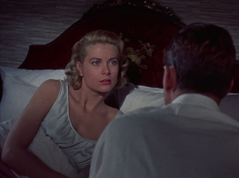 Grace Kelly and William Holden