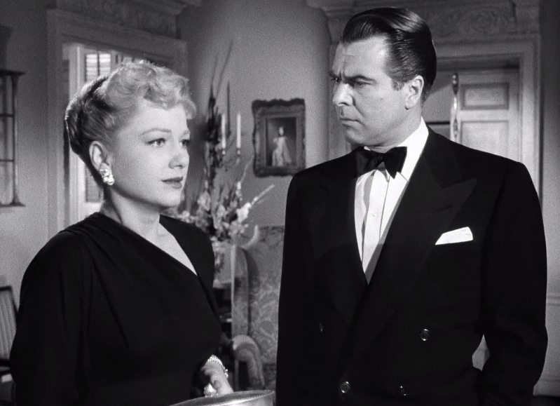 Anne Baxter and Roger Dann