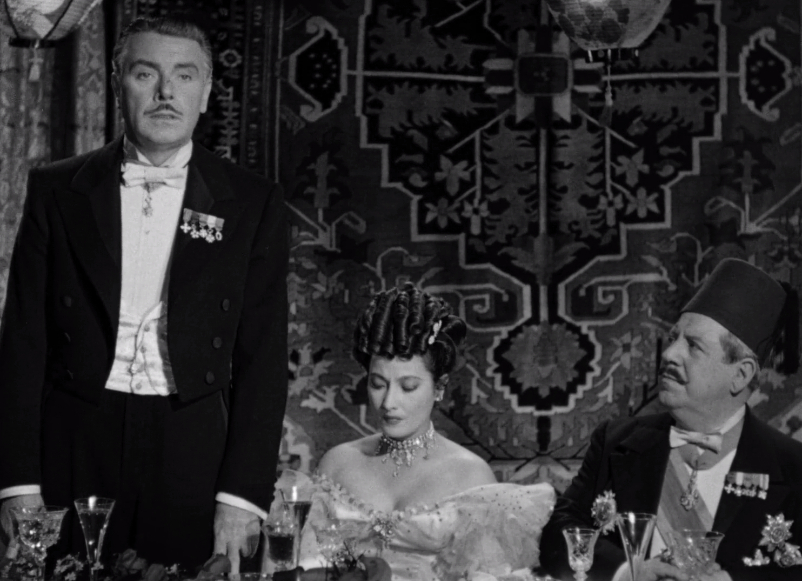 George Brent, Merle Oberon and George Humbert
