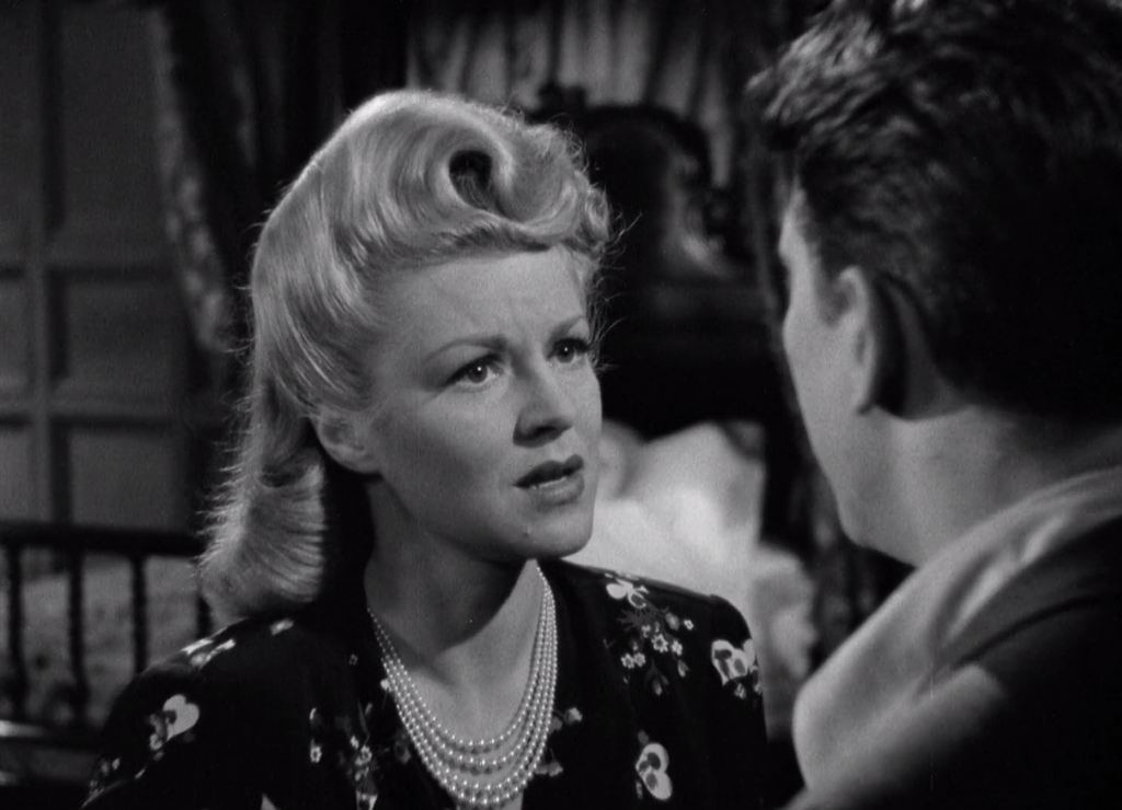 Claire Trevor and Burgess Meredith