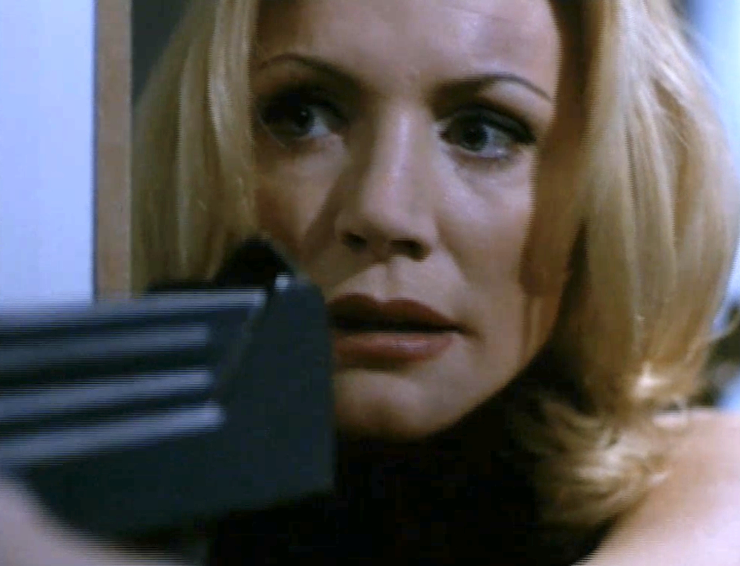 Shannon Tweed as "Sharon Bell"