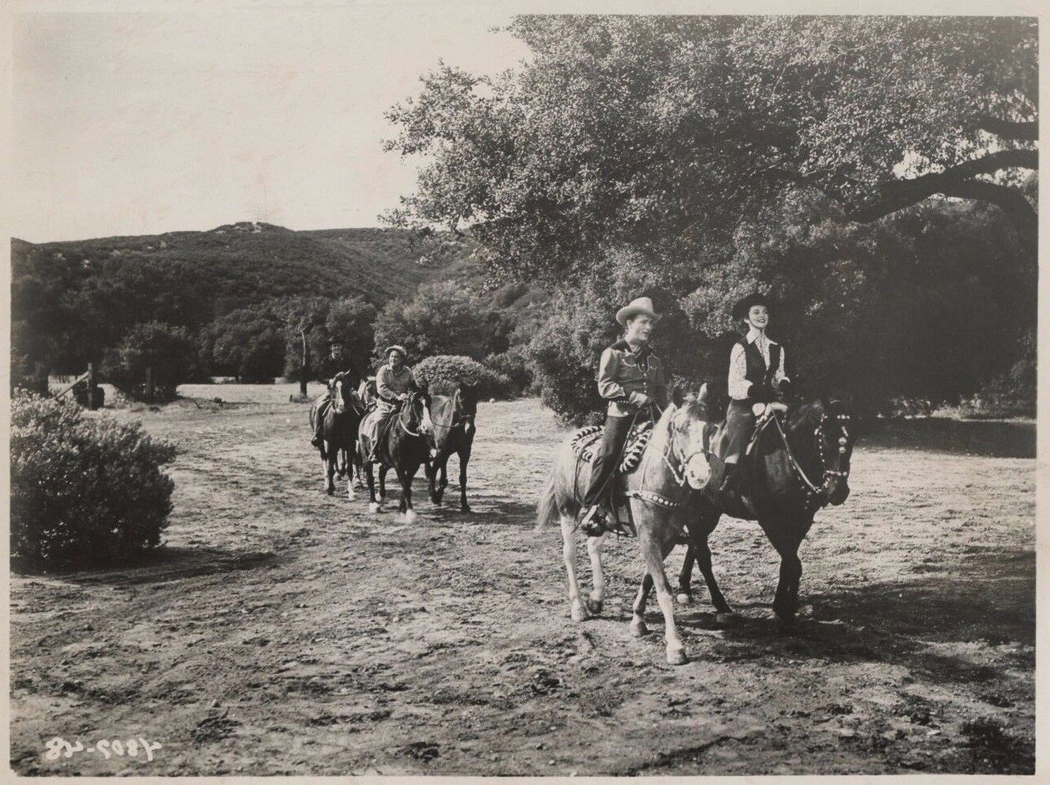 Jimmy Wakely, Christine Larsen