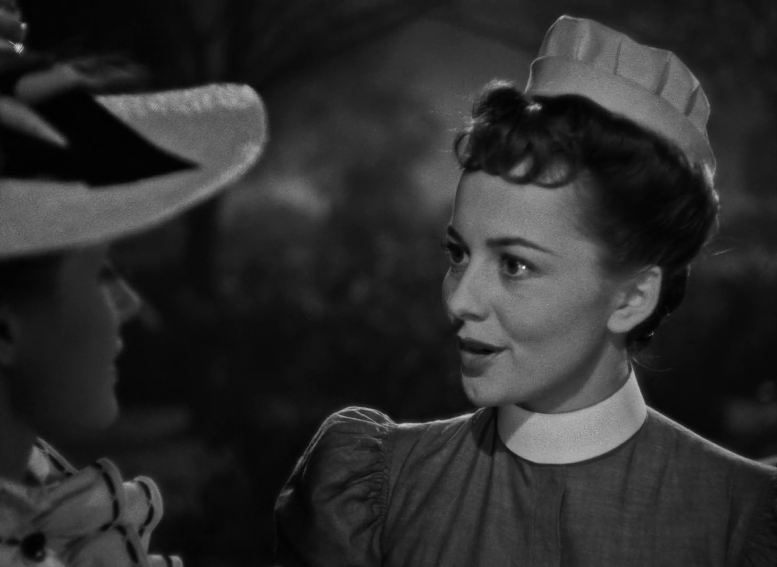 Rita Hayworth and Olivia de Havilland