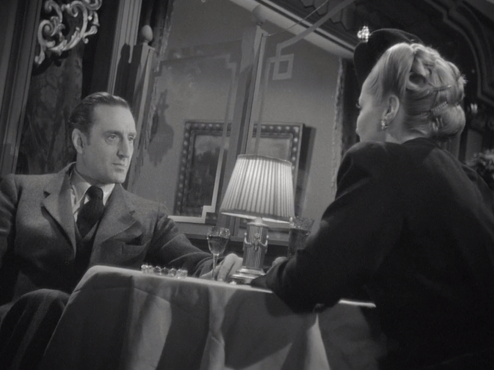 Basil Rathbone and Hillary Brooke