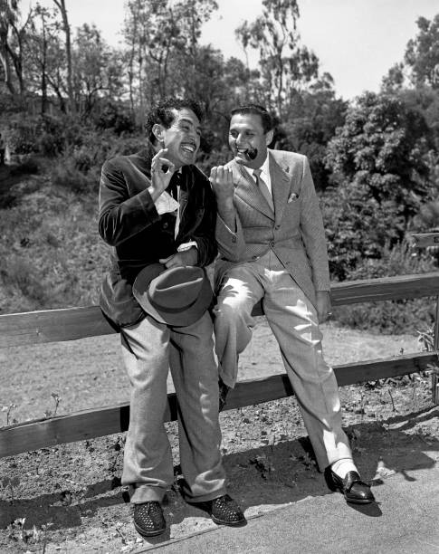 J. Carrol Naish, Cy Howard