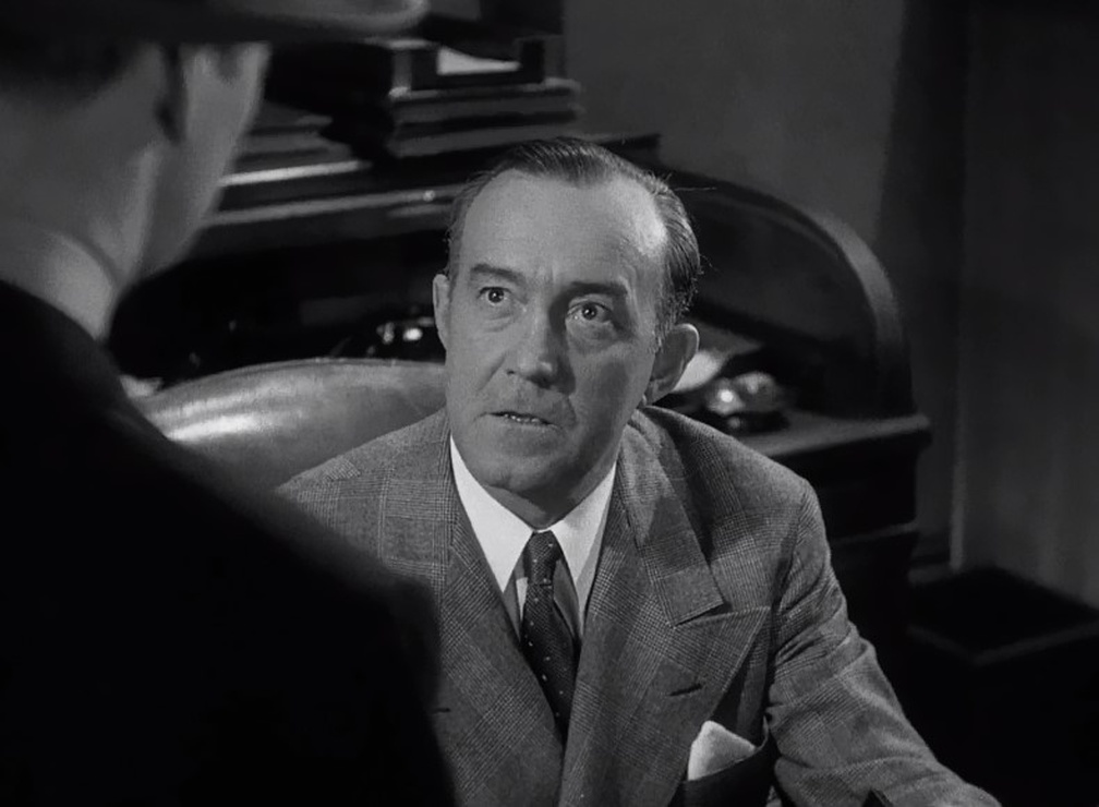 Alan Ladd and Donald MacBride