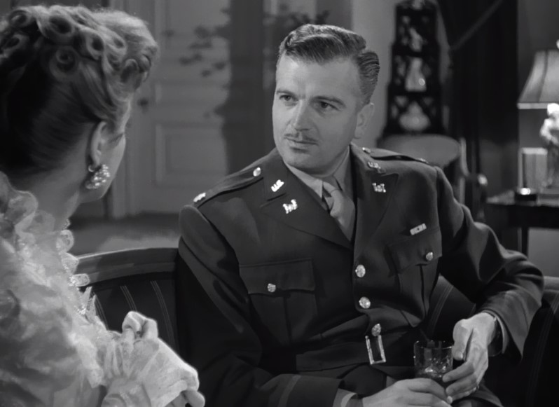 Miriam Hopkins and John Loder