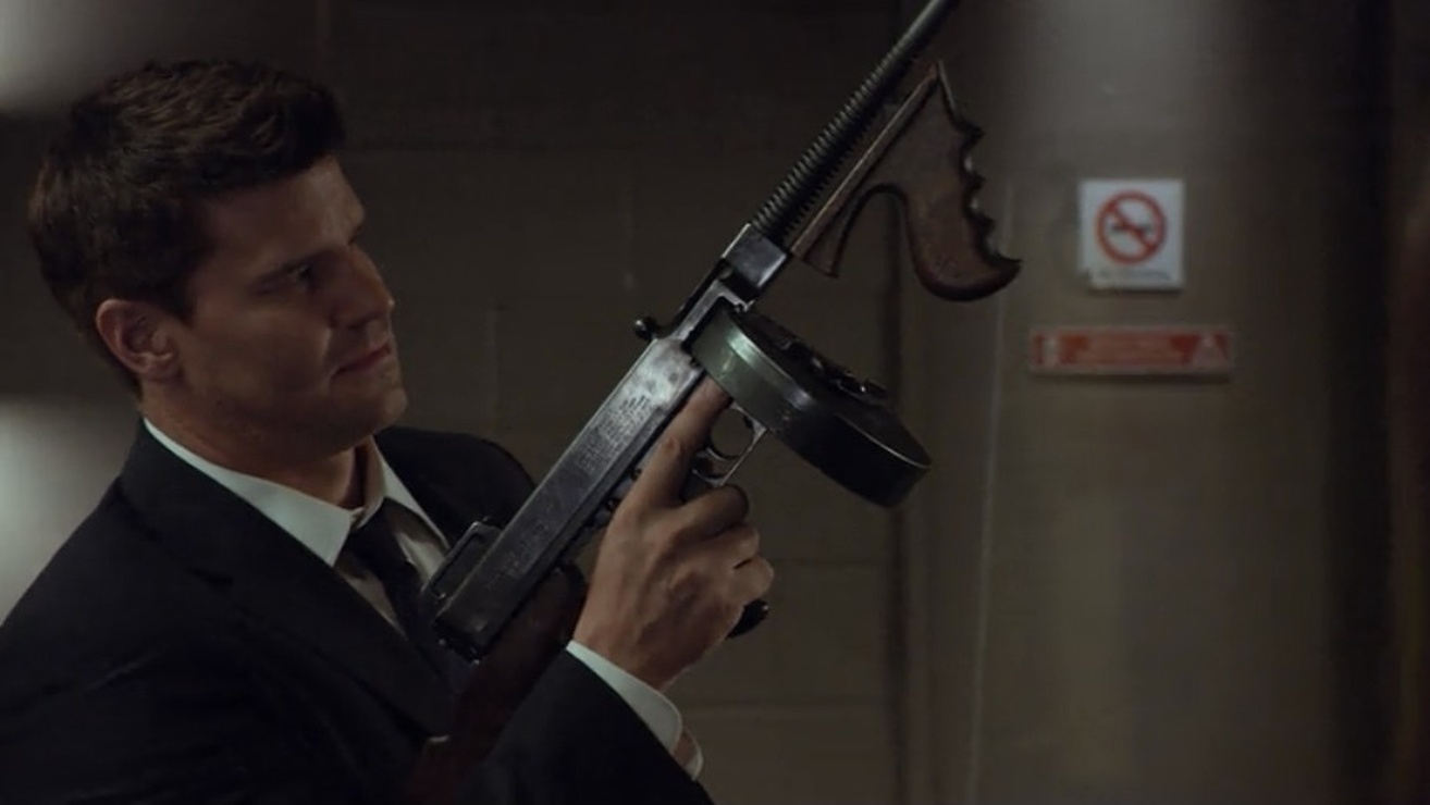 Booth, with a M1928 Thompson