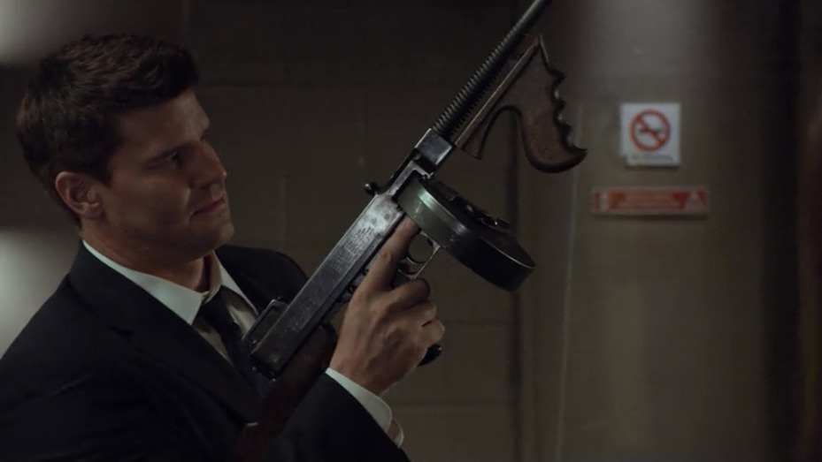 Booth, with a M1928 Thompson