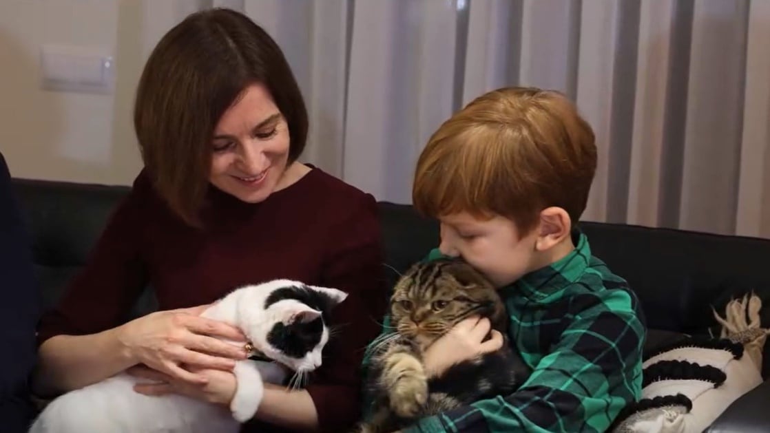 Maia Sandu, the president of Moldova, pets a cat a
