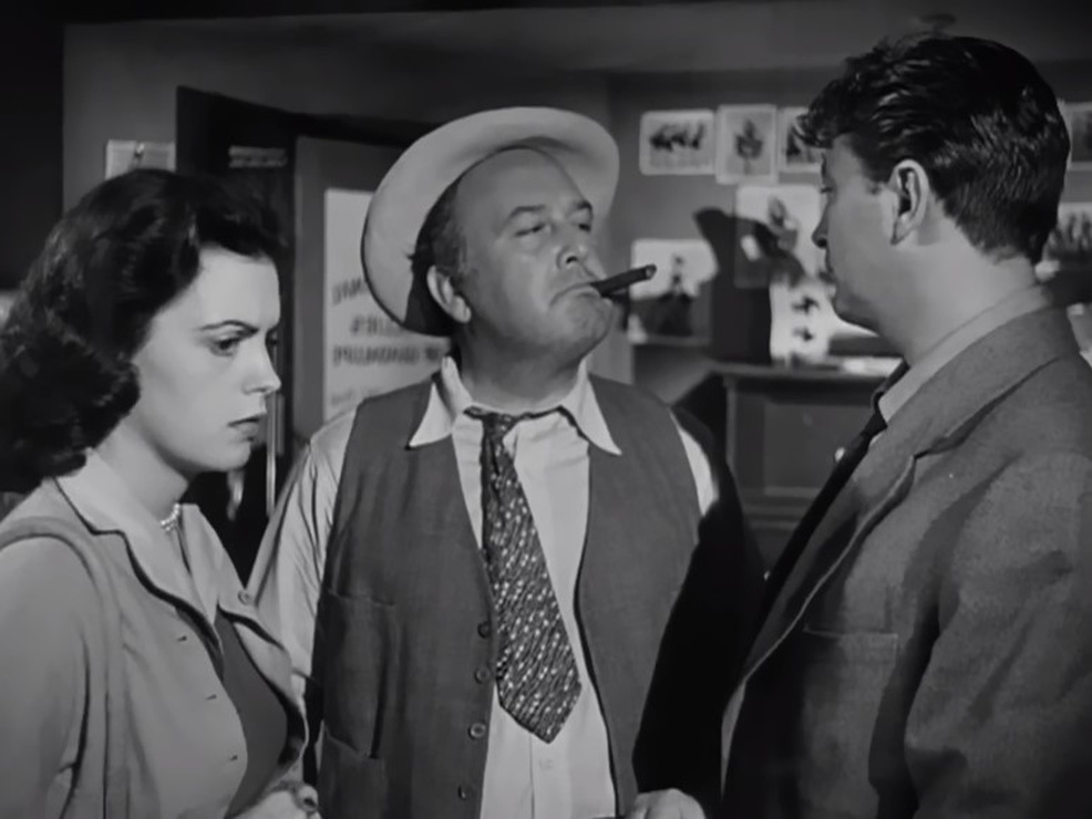 Faith Domergue, Ralph Dumke and Robert Mitchum