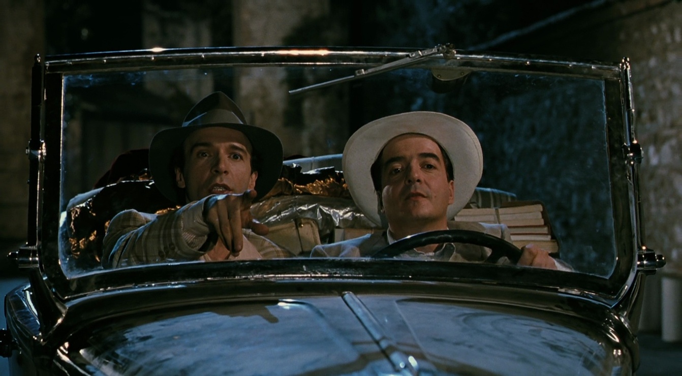 Roberto Benigni as Guido and Sergio Bustric as Fe