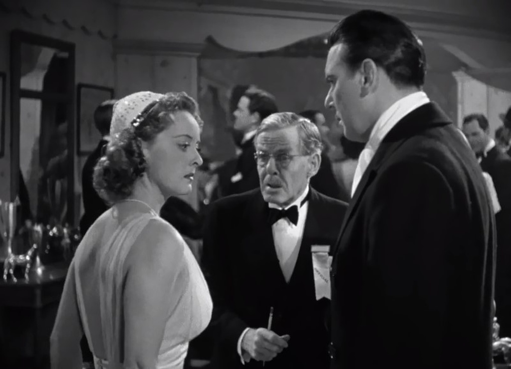 Bette Davis, Frank Darien and George Brent
