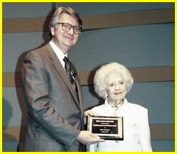 Rose Freedman receiving award from CA Assemblyman