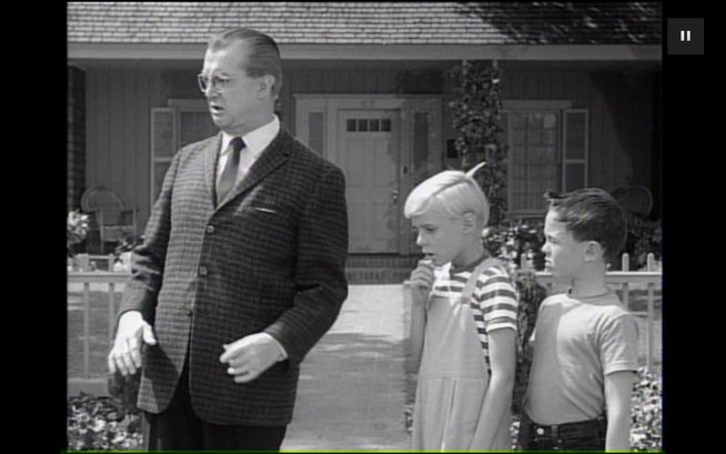 Billy Booth hugs Jay North while Mr. Wilson Punish