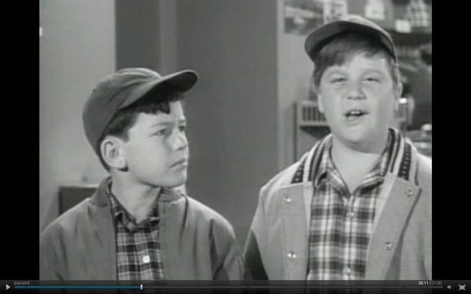 Rusty Stevens hugs Jerry Mathers as they look at t