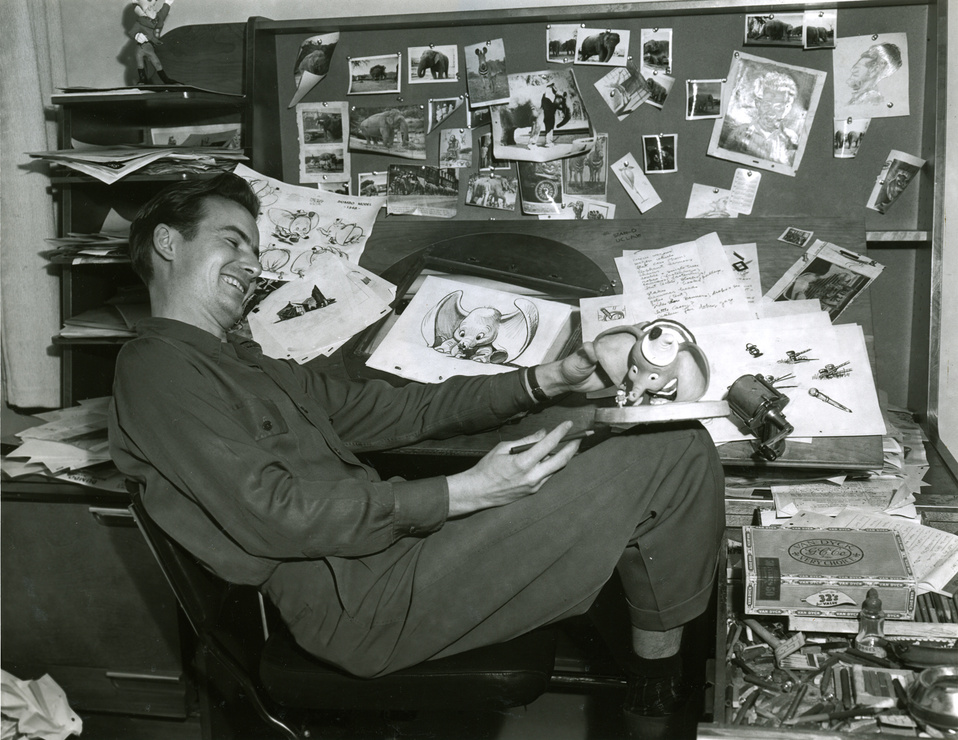 Bill Peet at his desk on 'Dumbo'