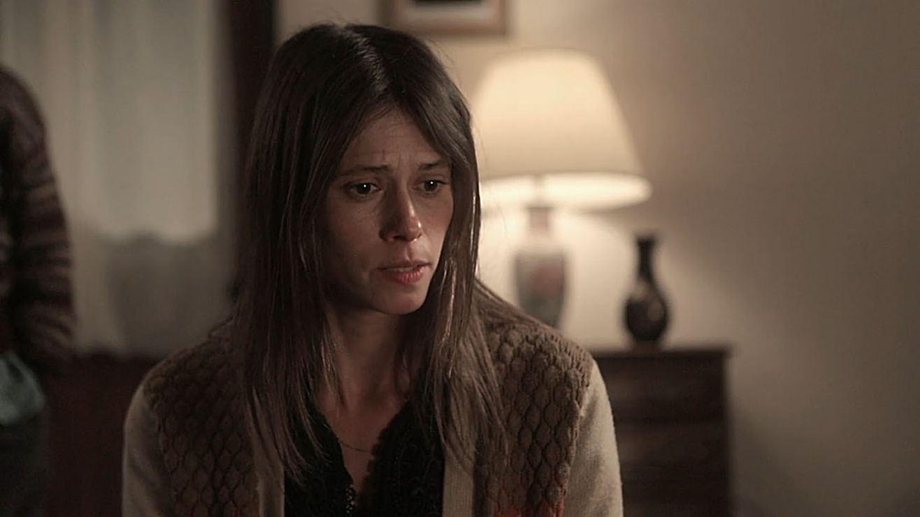 Angela Gots as Meela in Immigrant