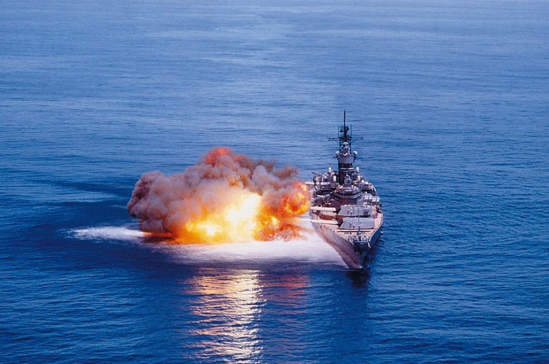 Battleship firing full broadside.
