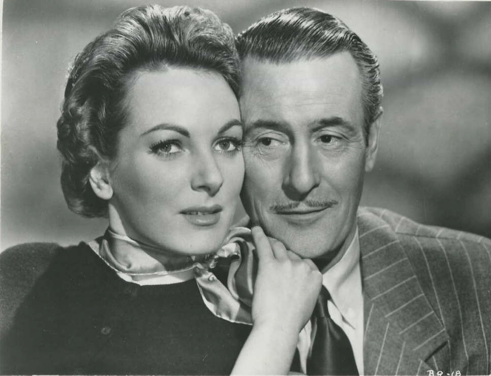 Delphi Lawrence, Tom Conway